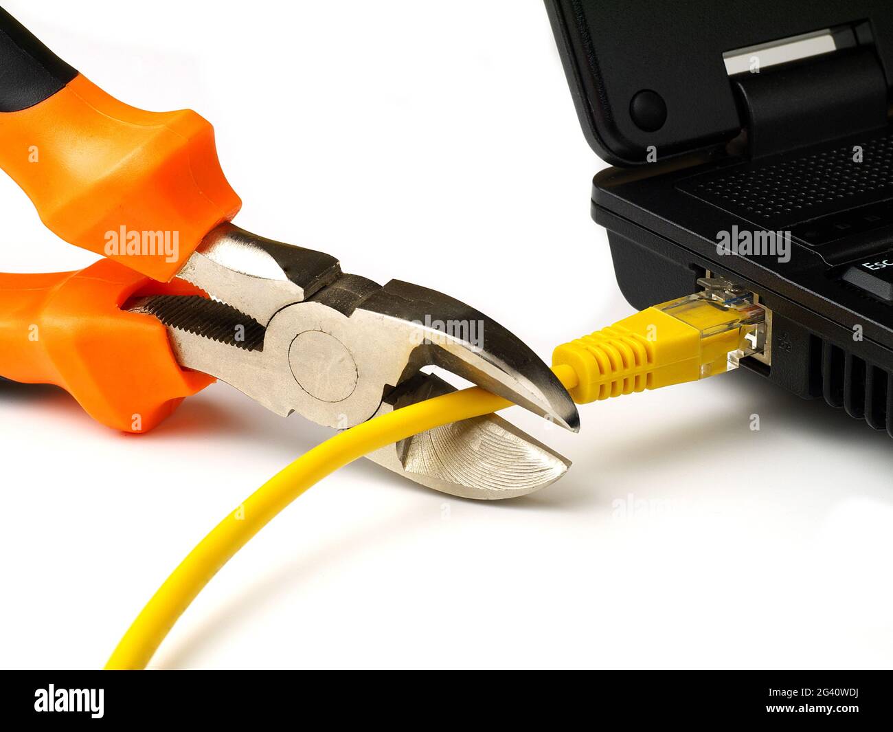wire cutter cutting network cable from laptop on white background Stock ...