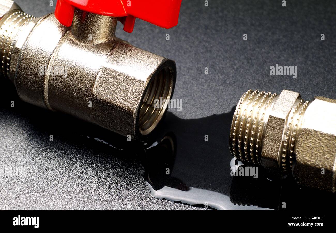 water leaking from disconnected valve and fitting, closeup Stock Photo ...