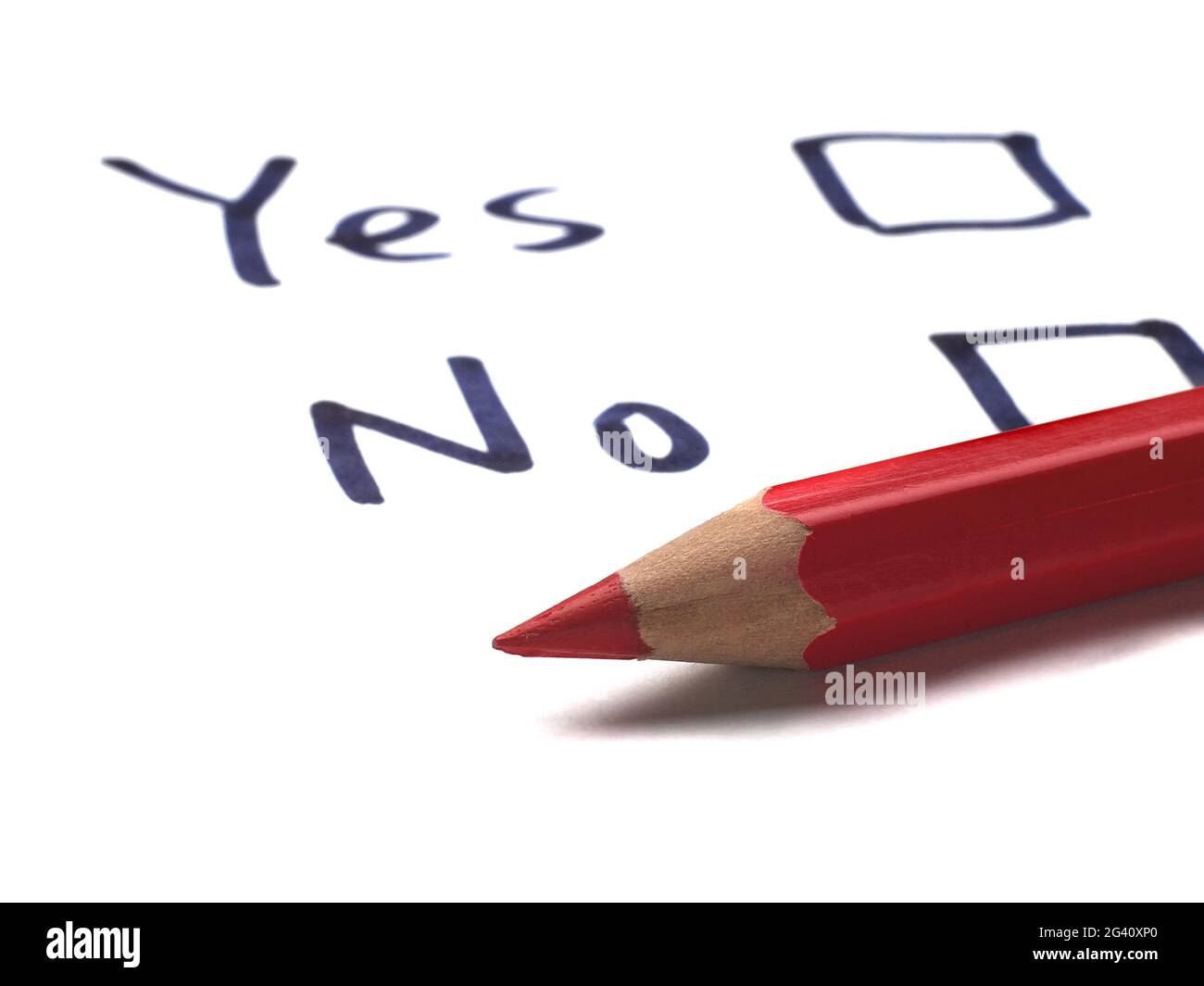 yes and no check boxes on white paper and red pencil Stock Photo - Alamy