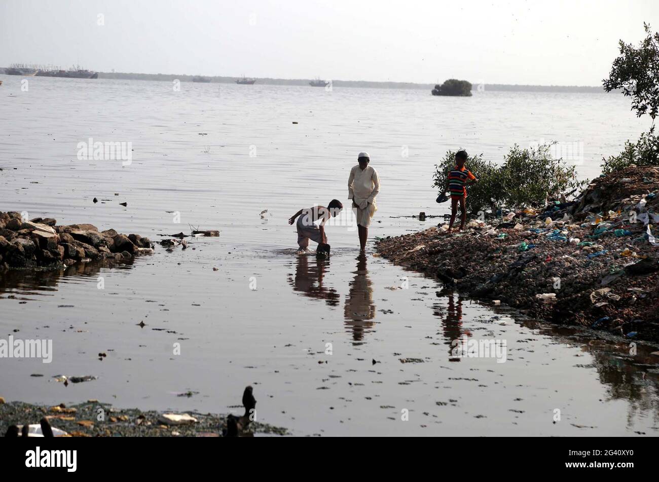 Children are busy in playing at Arabian Sea without any fear that may ...