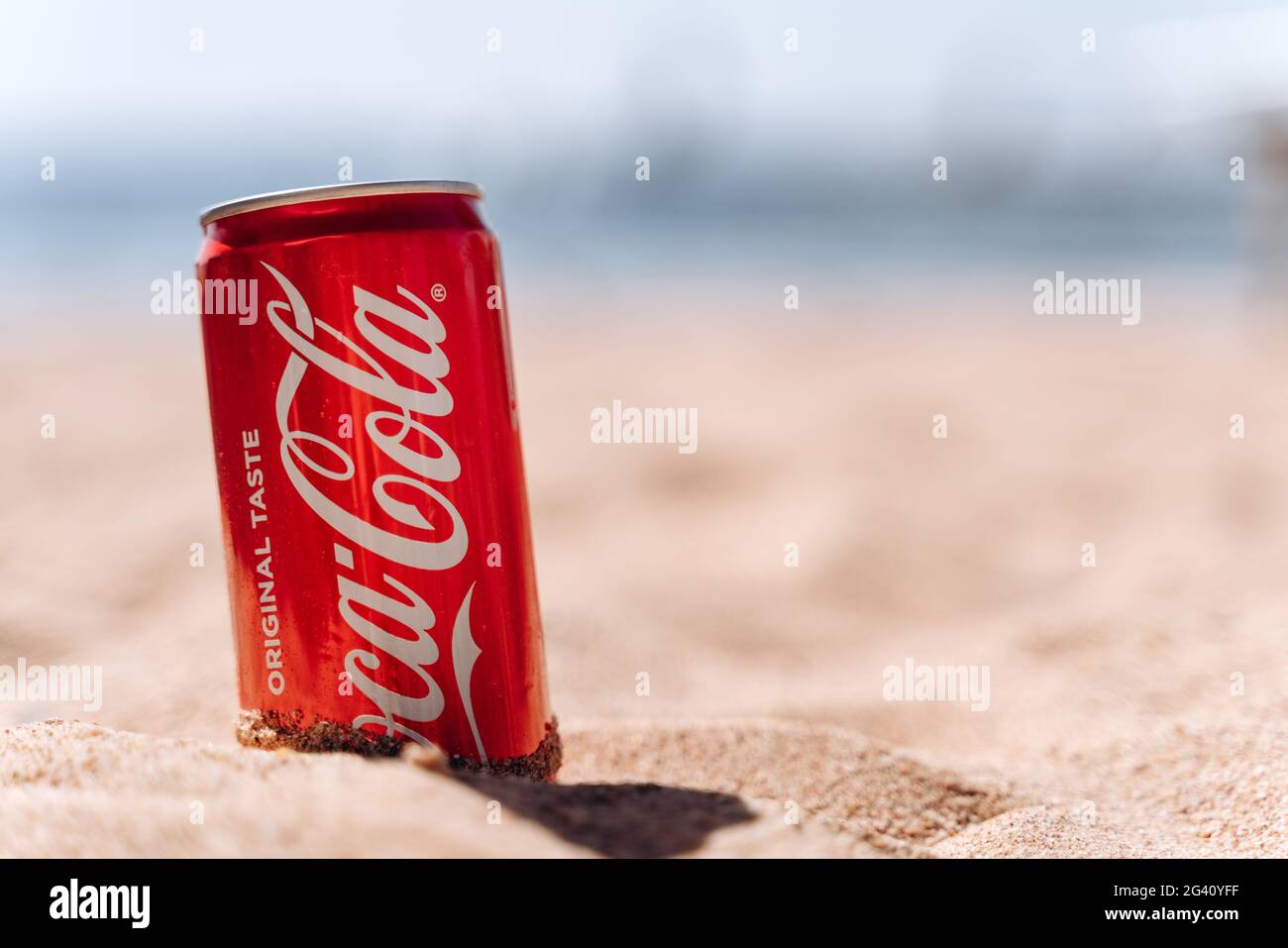 Popular, carbonated drink on the sandy beach. Coca-Cola is a popular ...