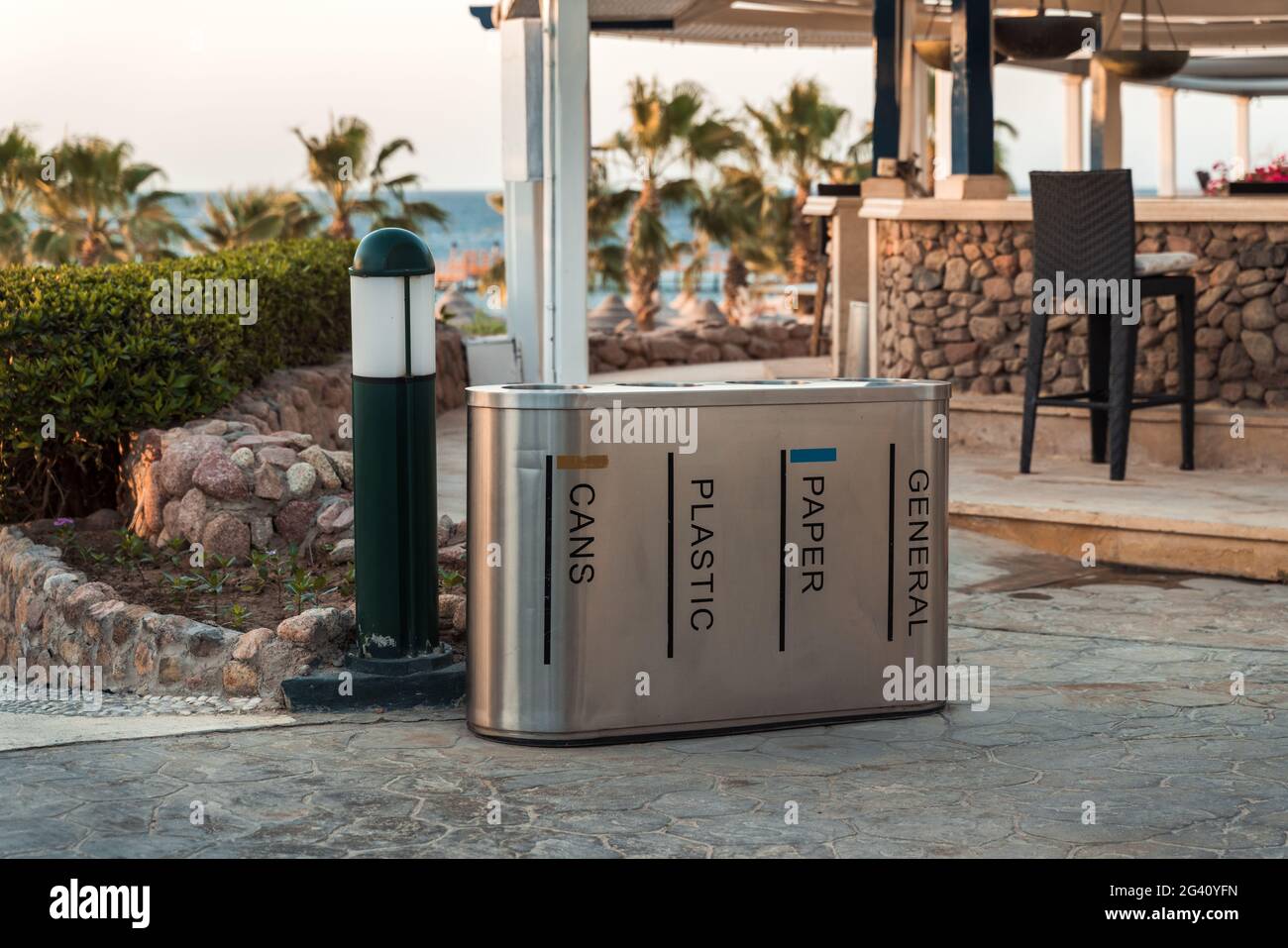 Garbage in trash cans with sorted garbage. Recycling of garbage Stock ...