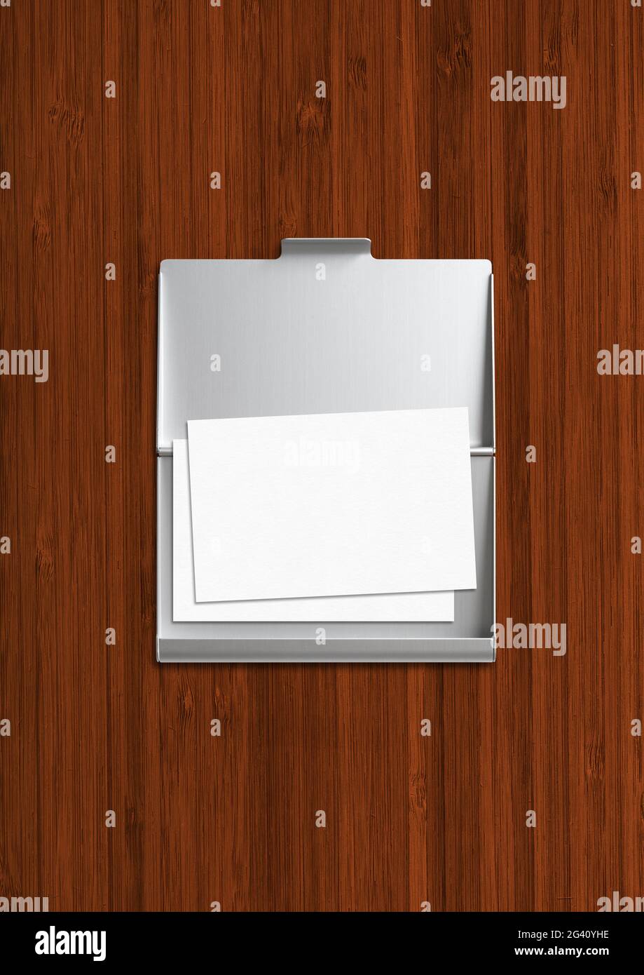 Closed card holder isolated on dark wooden background Stock Photo - Alamy