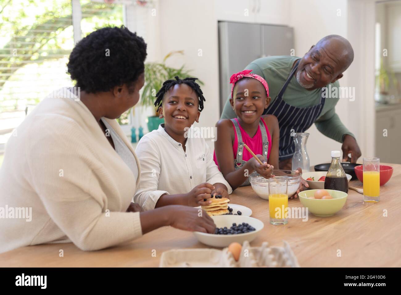 Black boy cooking in the kitchen hi-res stock photography and images ...