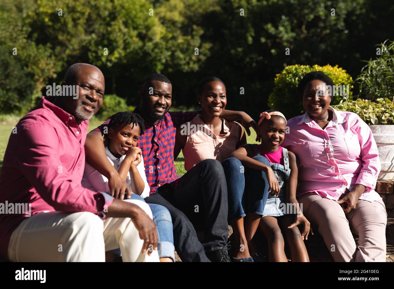 Smiling african american parents with children and their grandparents ...