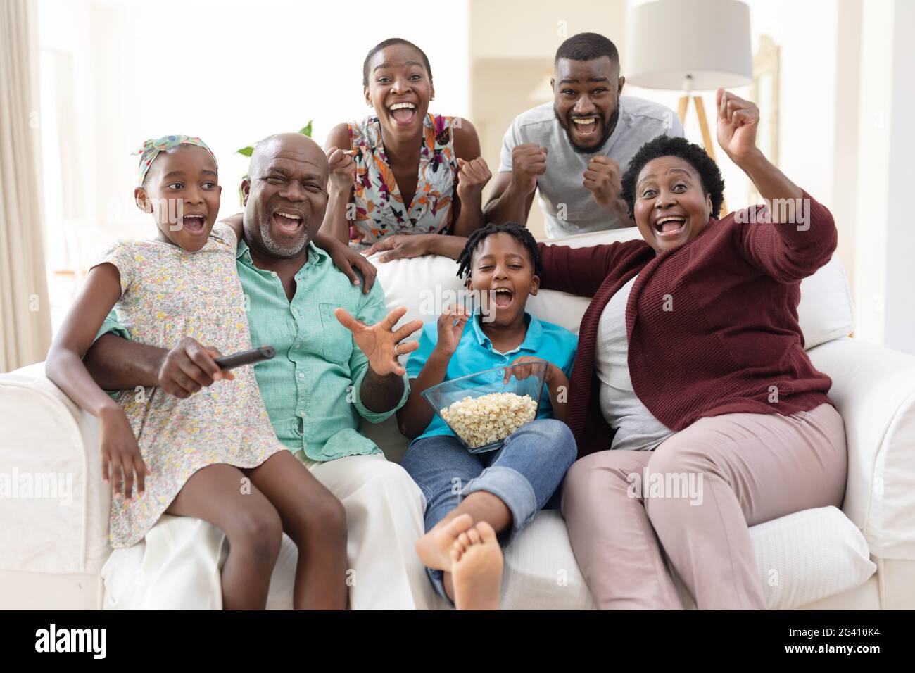 Excited african american parents, grandparents and grandchildren on ...