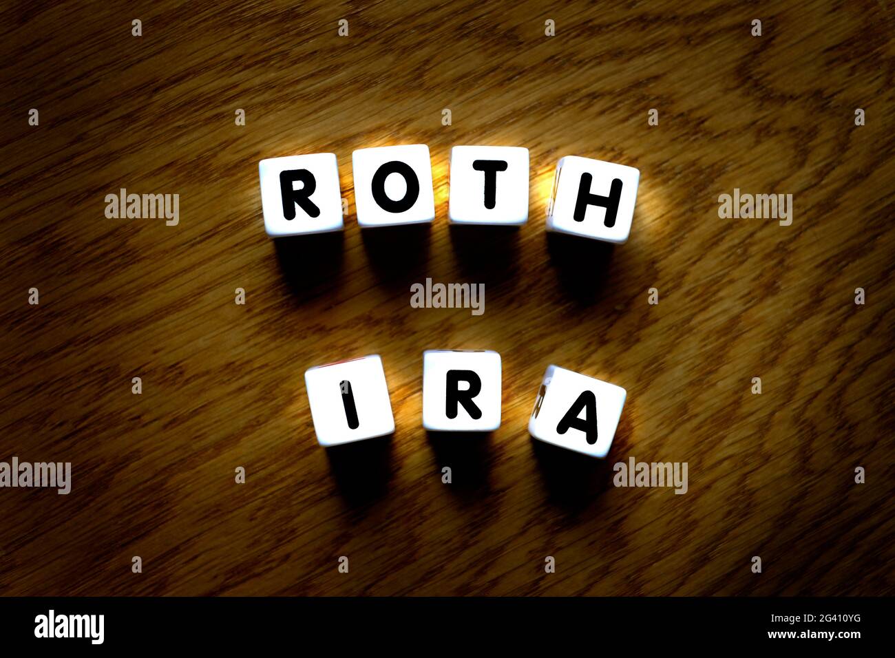 Roth IRA spelled out with dice for retirement planning and savings ...