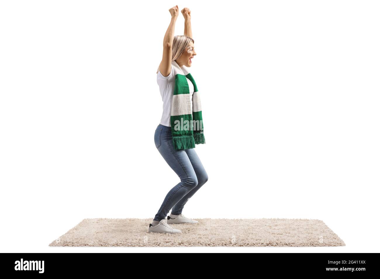 Happy young woman cheering with a scarf isolated on white background ...
