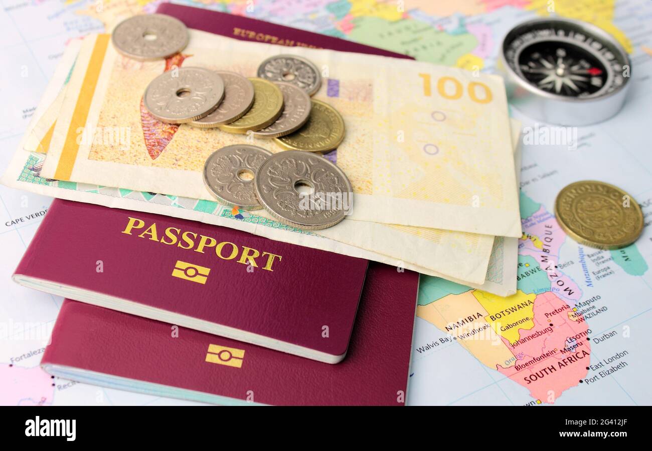 A EU passports on Danish money, with a map and compass to symbolize ...