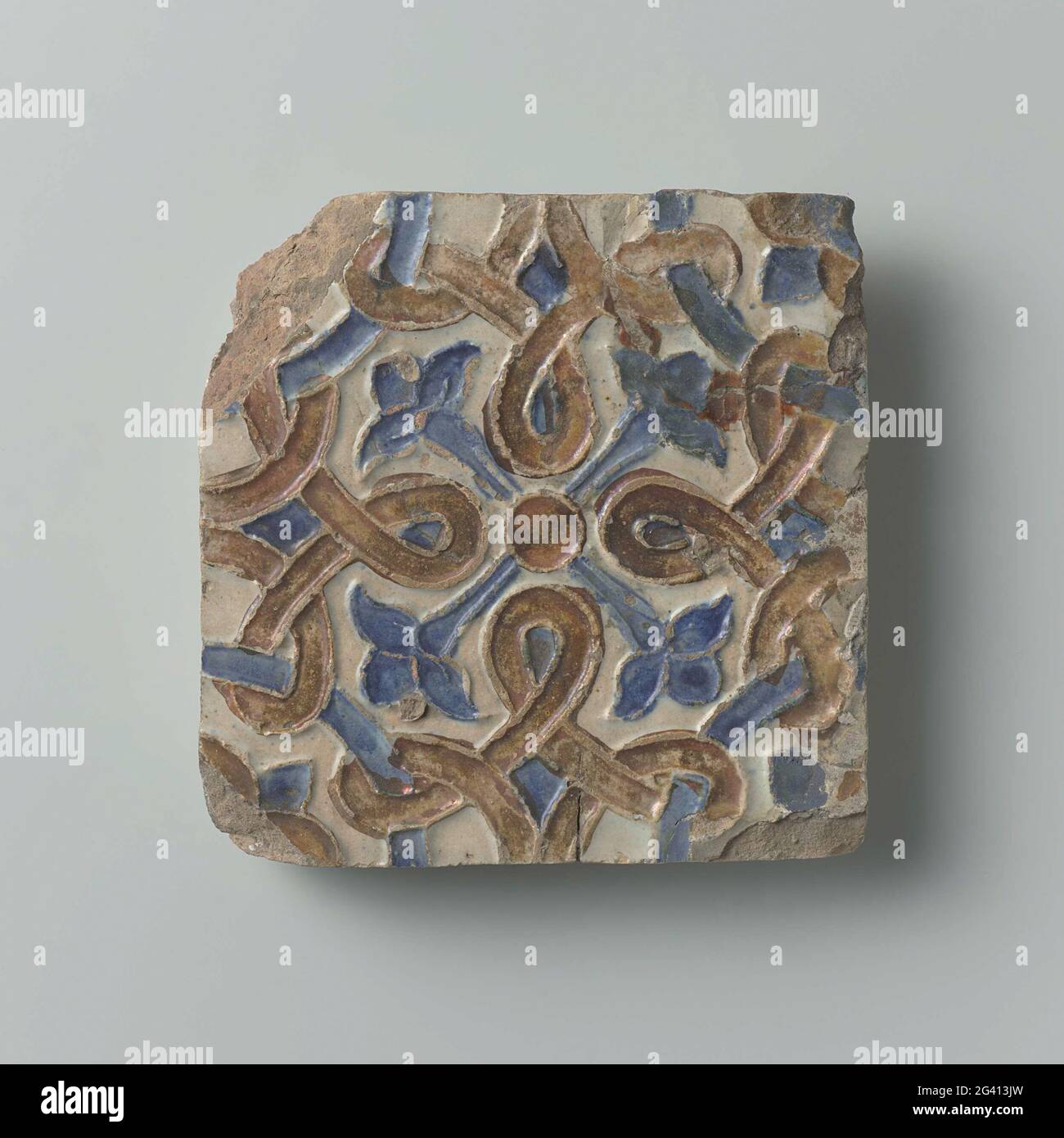 Tile. Tile, painted in white, blue and yellow / brown, glaze deepened ...