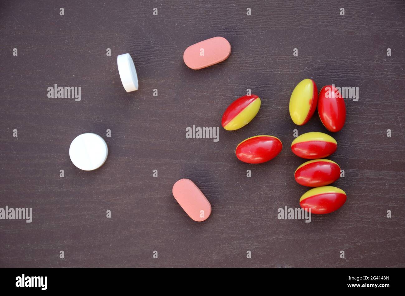 closeup bunch the pink ,white with red,yellow color small medicines ...