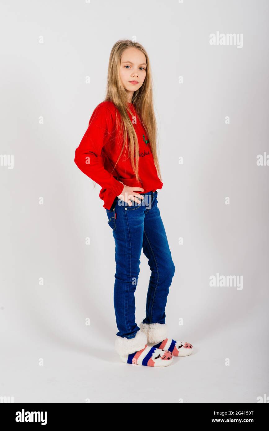 Girl 12-13 years old isolate on a white background. Childhood lifestyle ...