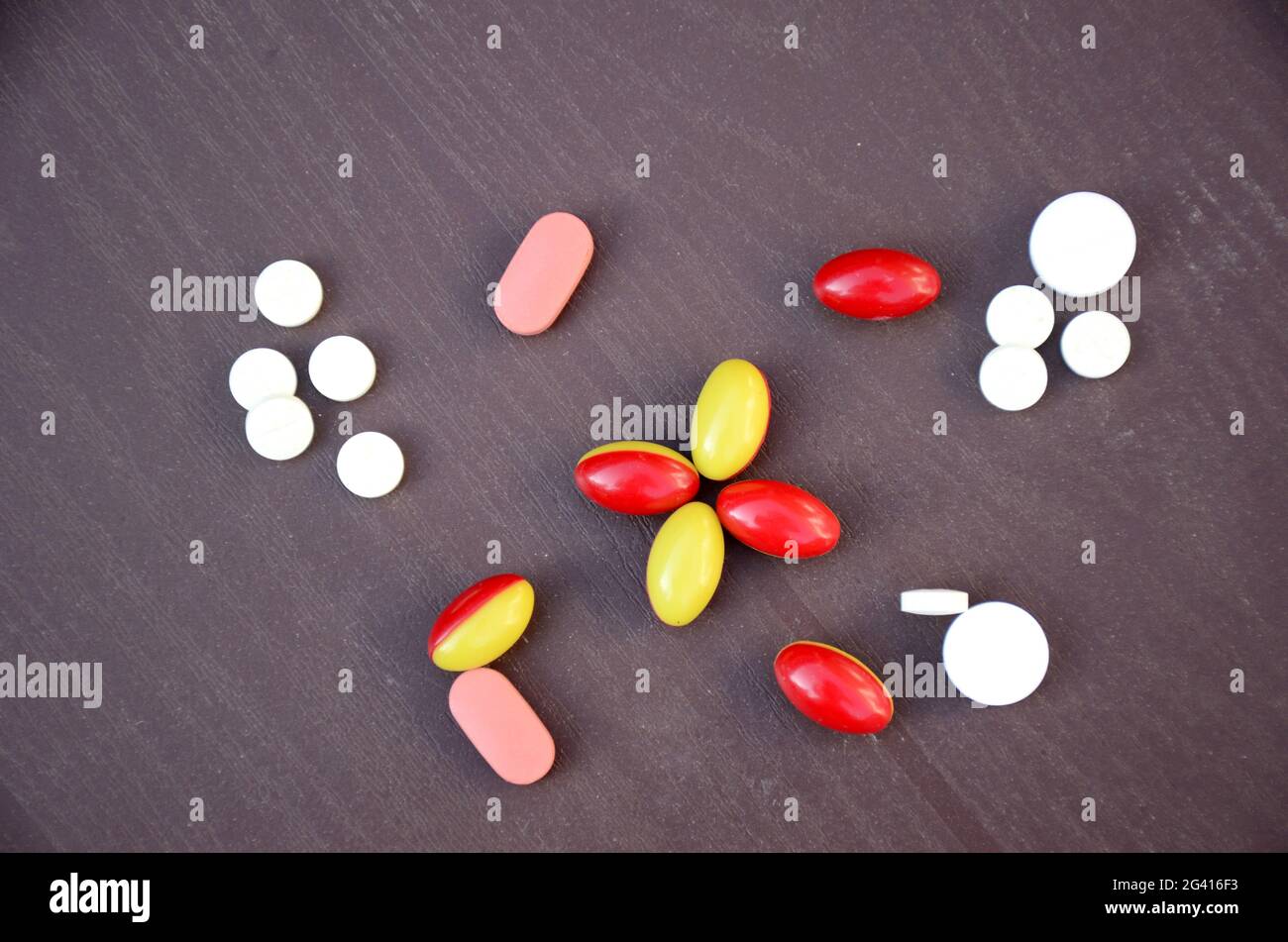 closeup bunch the pink ,white with red,yellow color small medicines ...