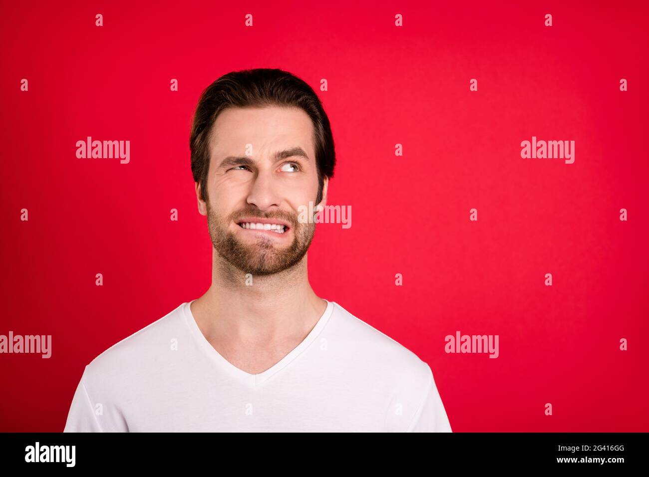 Photo of unhappy upset young man look empty space problem bad mood ...