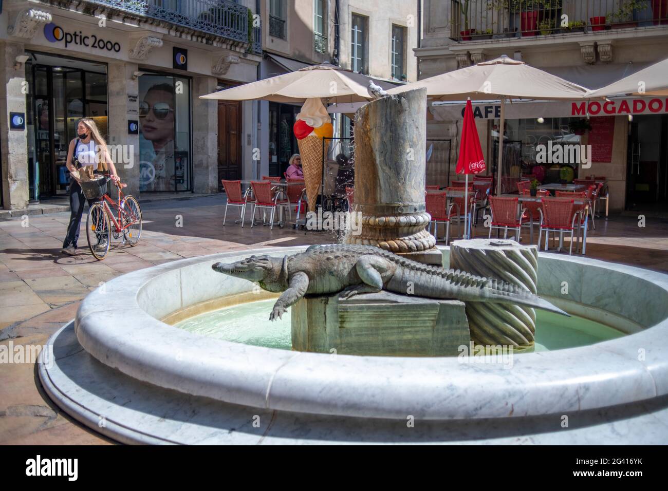 Public fountain in Nimes, France of the city's symbol, the crocodile ...