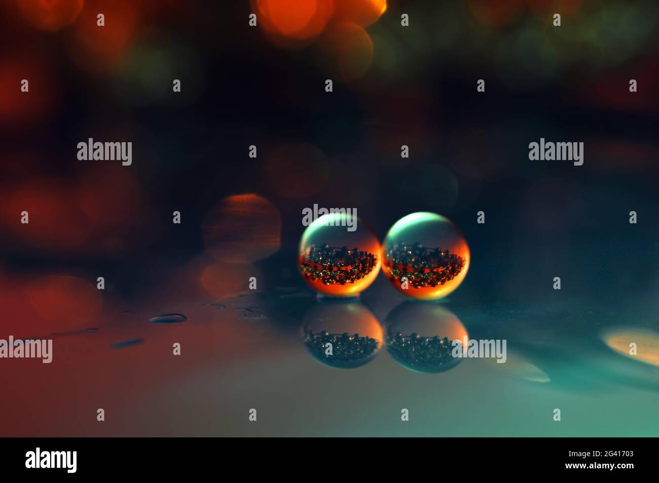 Big water drops, 3d balls on a blurry background with light effects and ...