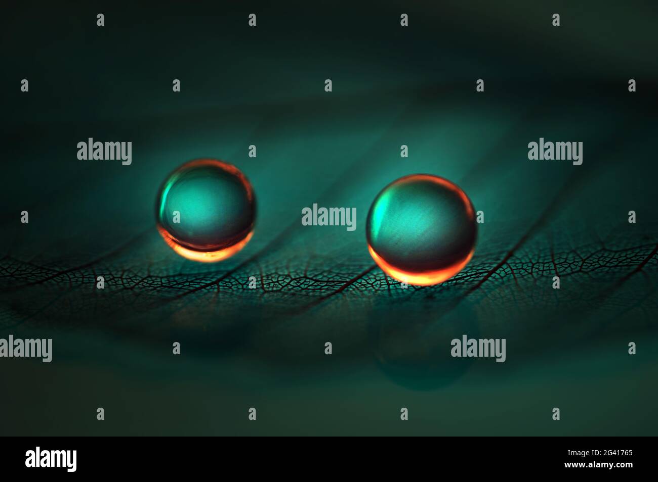 Big water drops, 3d balls on a blurry background with light effects and ...