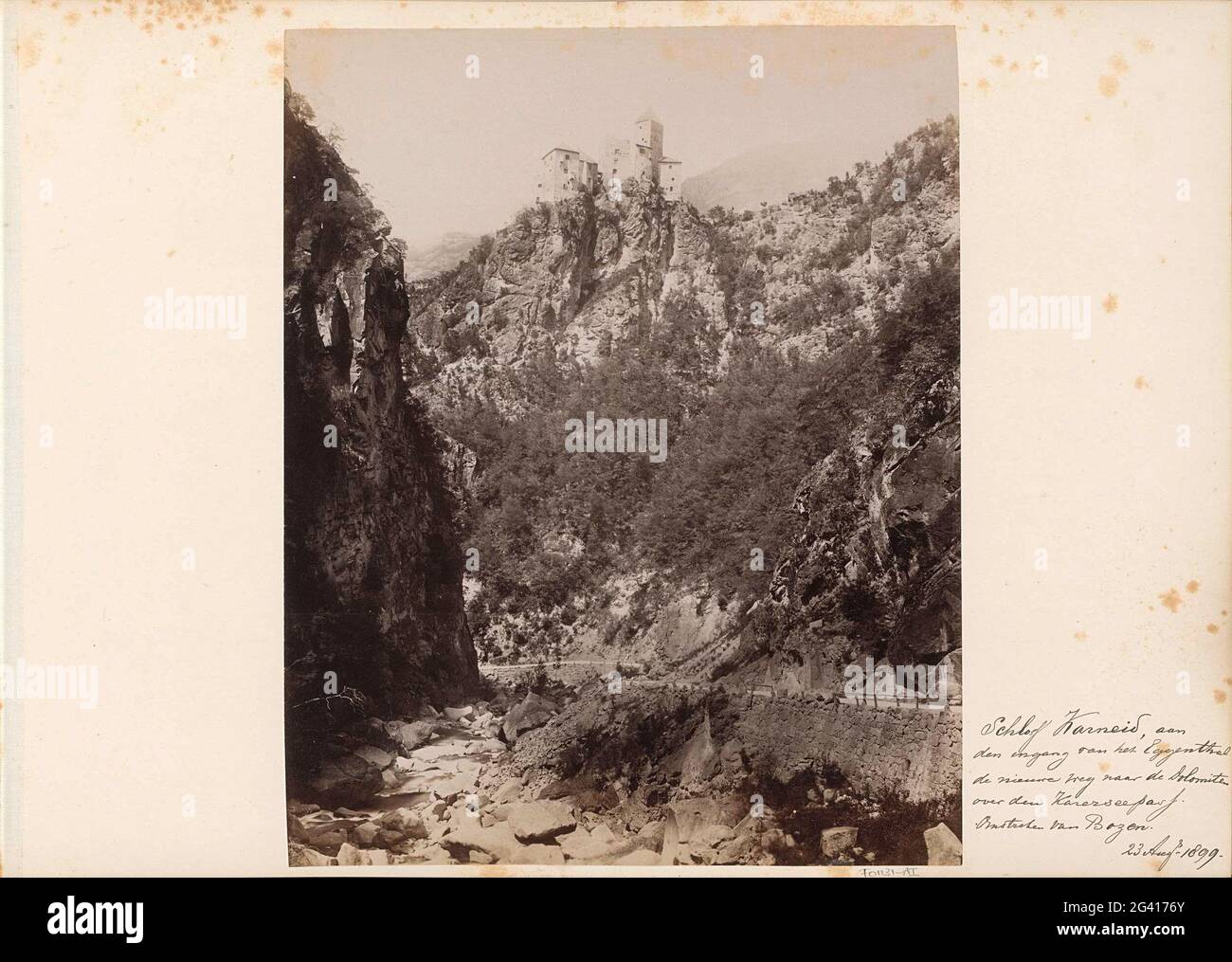 Mountain gorge and away in the egg tal with Karneid castle on the rocks ...
