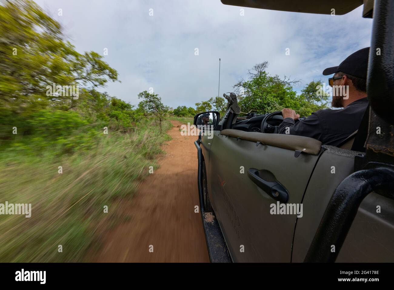 Side view of a safari vehicle operated by luxury resort tented Magashi ...