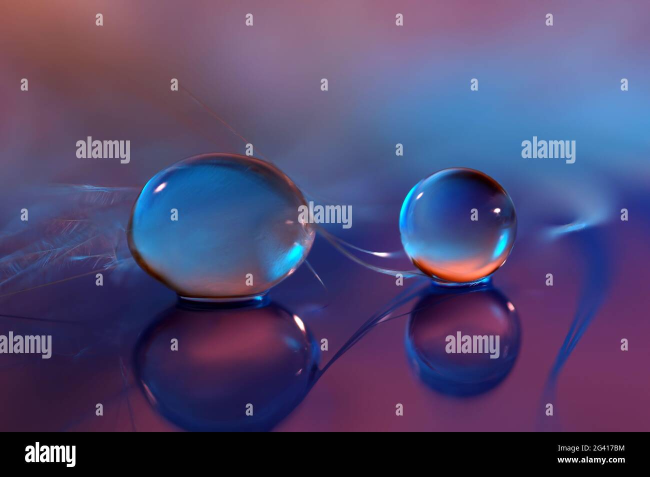 Big water drops, 3d balls on a blurry background with light effects and ...