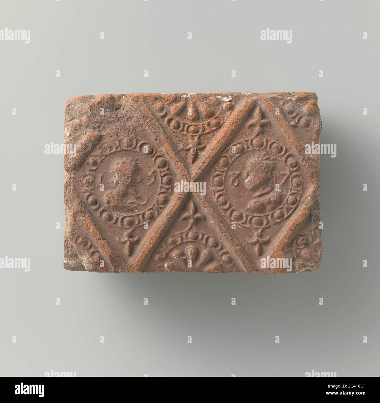 Fireplace of baked earth with diamond-shaped distribution. Fireplace of ...