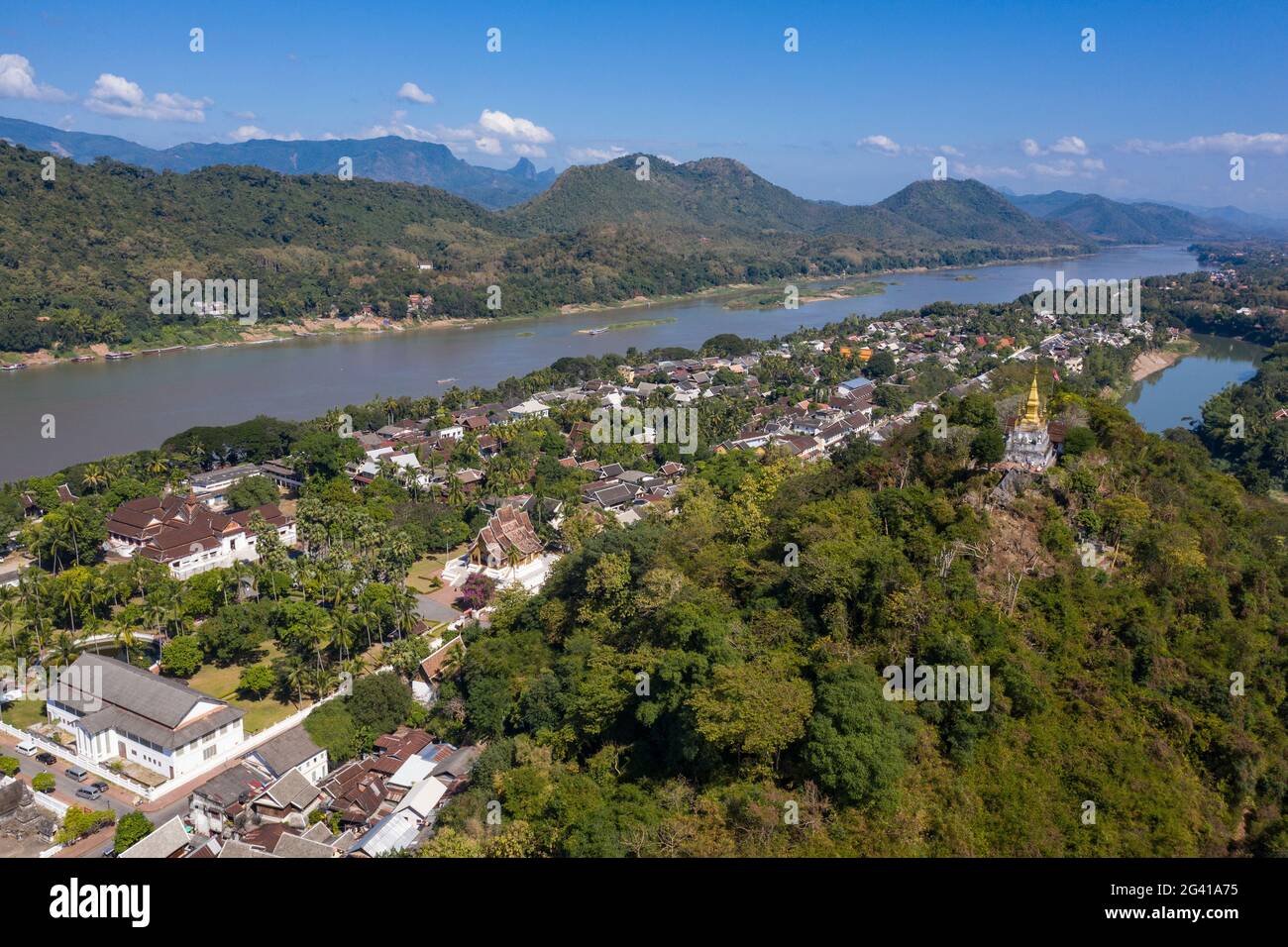 Aerial view of the pagoda on Mount Phousi with the Mekong River behind ...