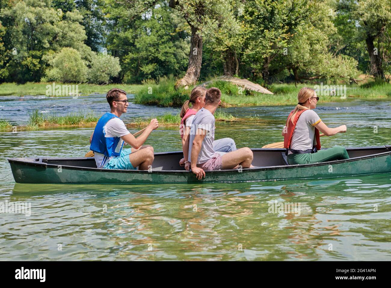 Group adventurous explorer friends are canoeing in a wild river Stock ...