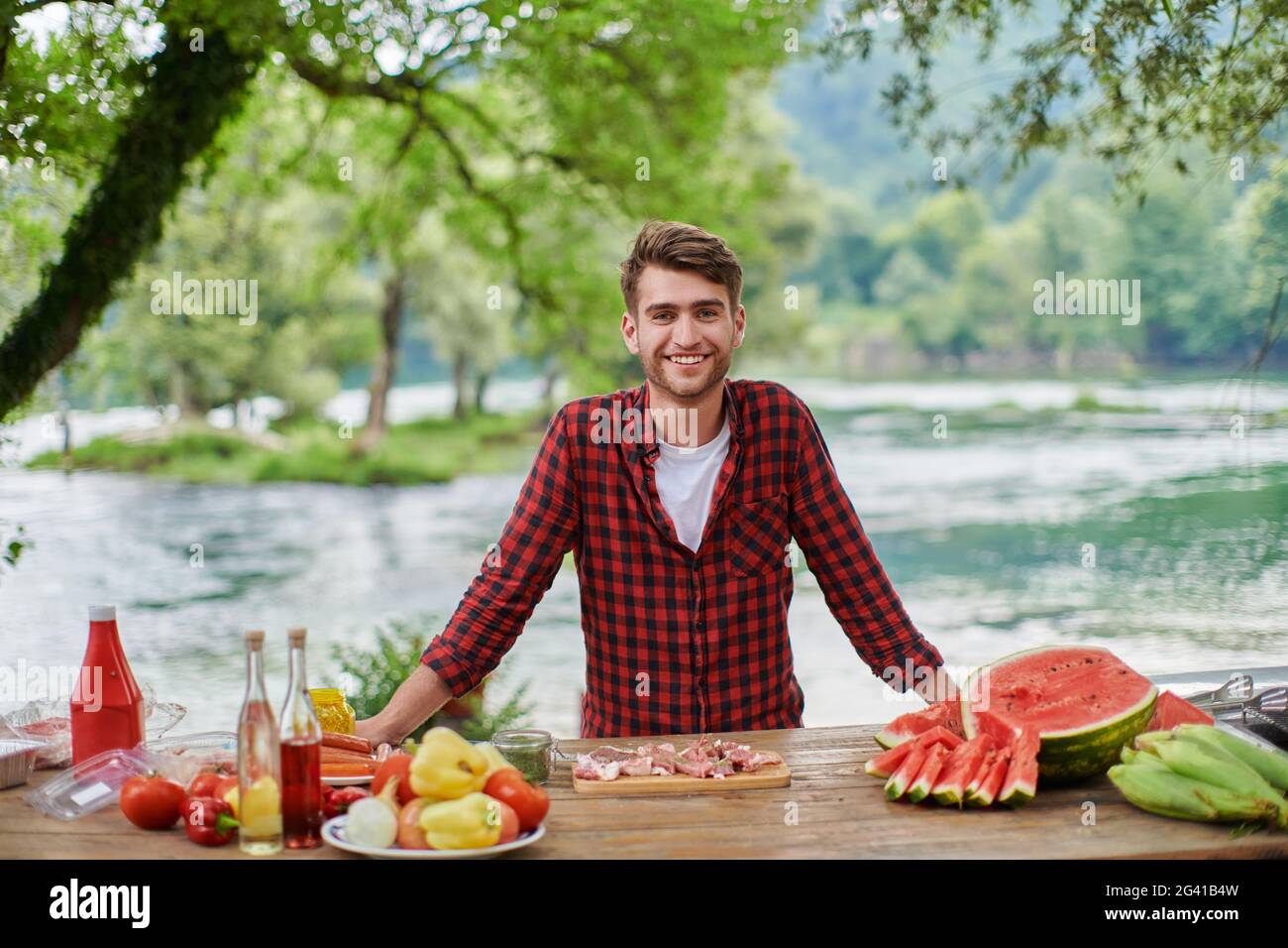 Man cooking tasty food for french dinner party Stock Photo - Alamy