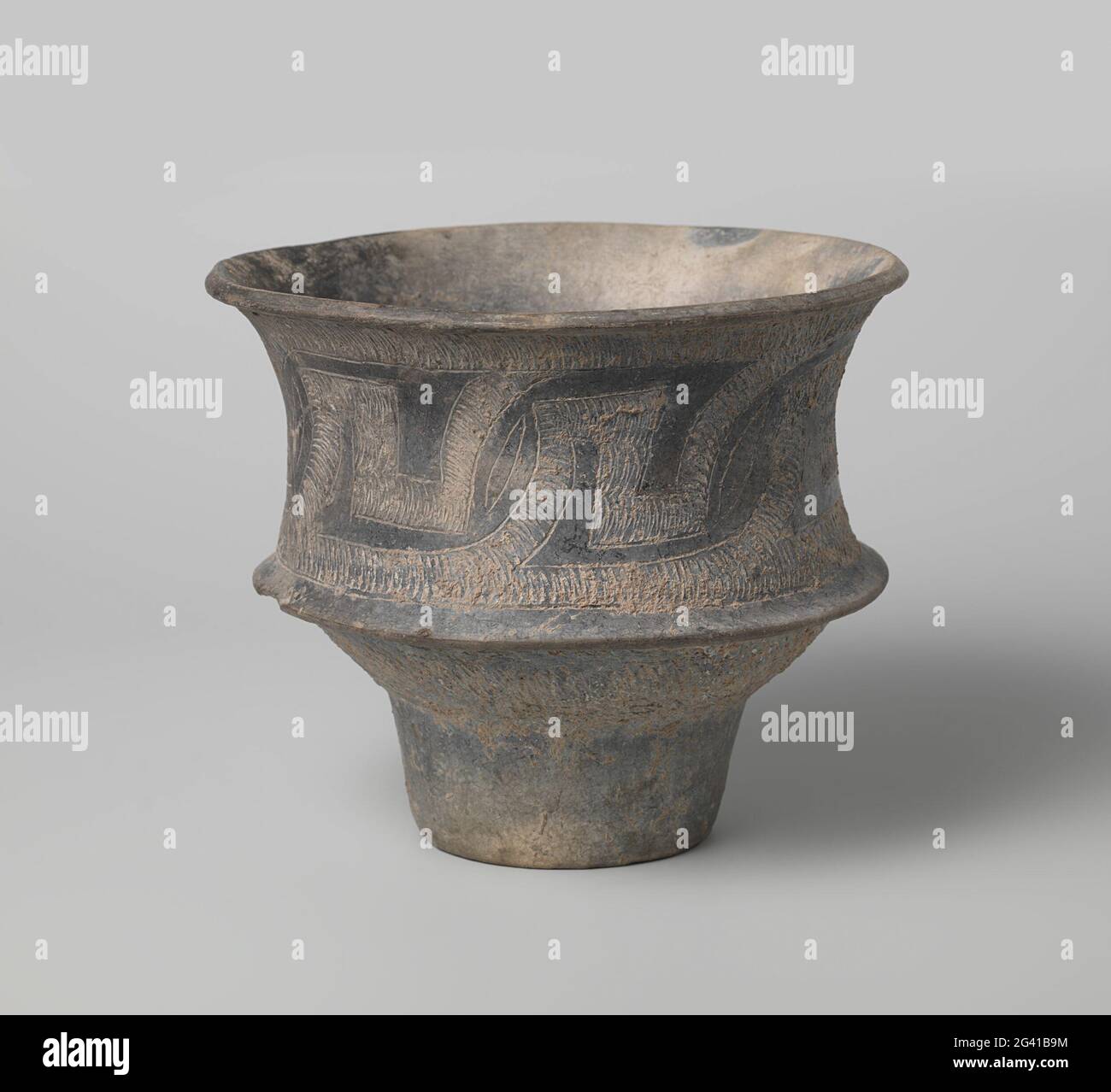 Jar With Geometric Patterns. Pot of pottery on a high, narrow foot and ...