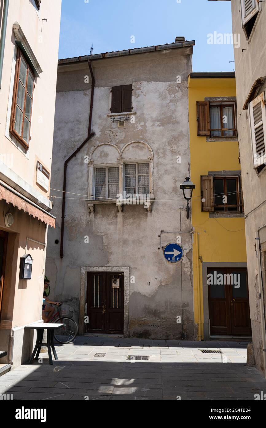 Muggia, Italy. June 13, 2021. An ancient house in the historic center ...
