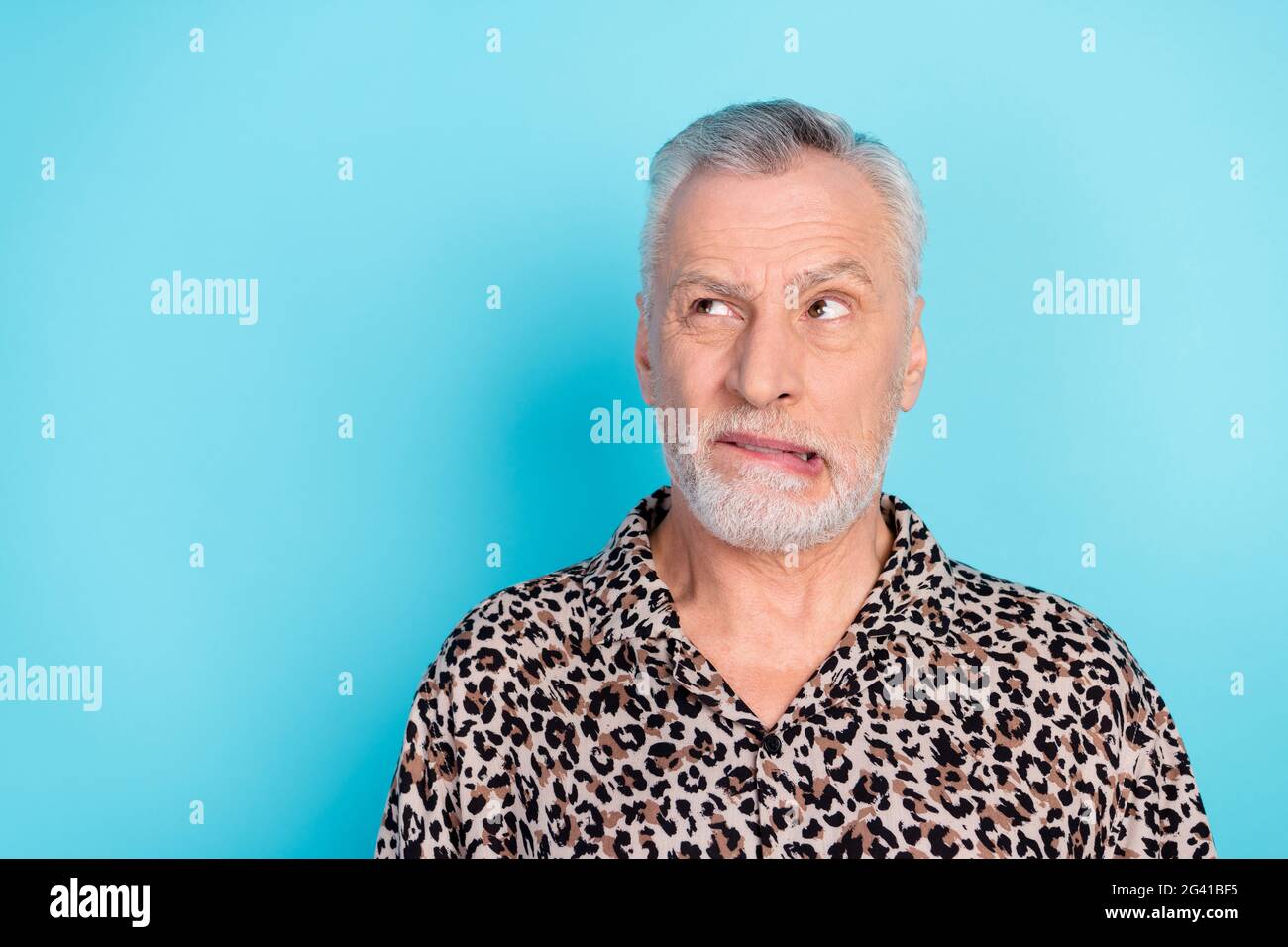 Photo Of Unhappy Sad Upset Old Man Worry Look Empty Space Bite Lip