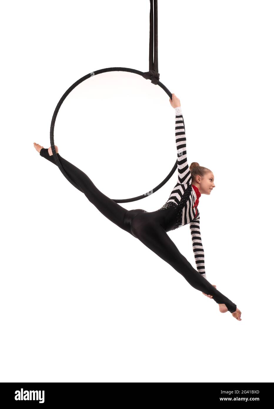 Aerial teen acrobat performing split on air hula hoop Stock Photo - Alamy