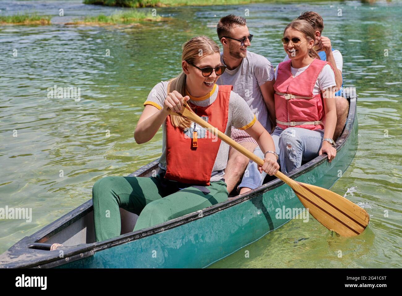 Group adventurous explorer friends are canoeing in a wild river Stock ...