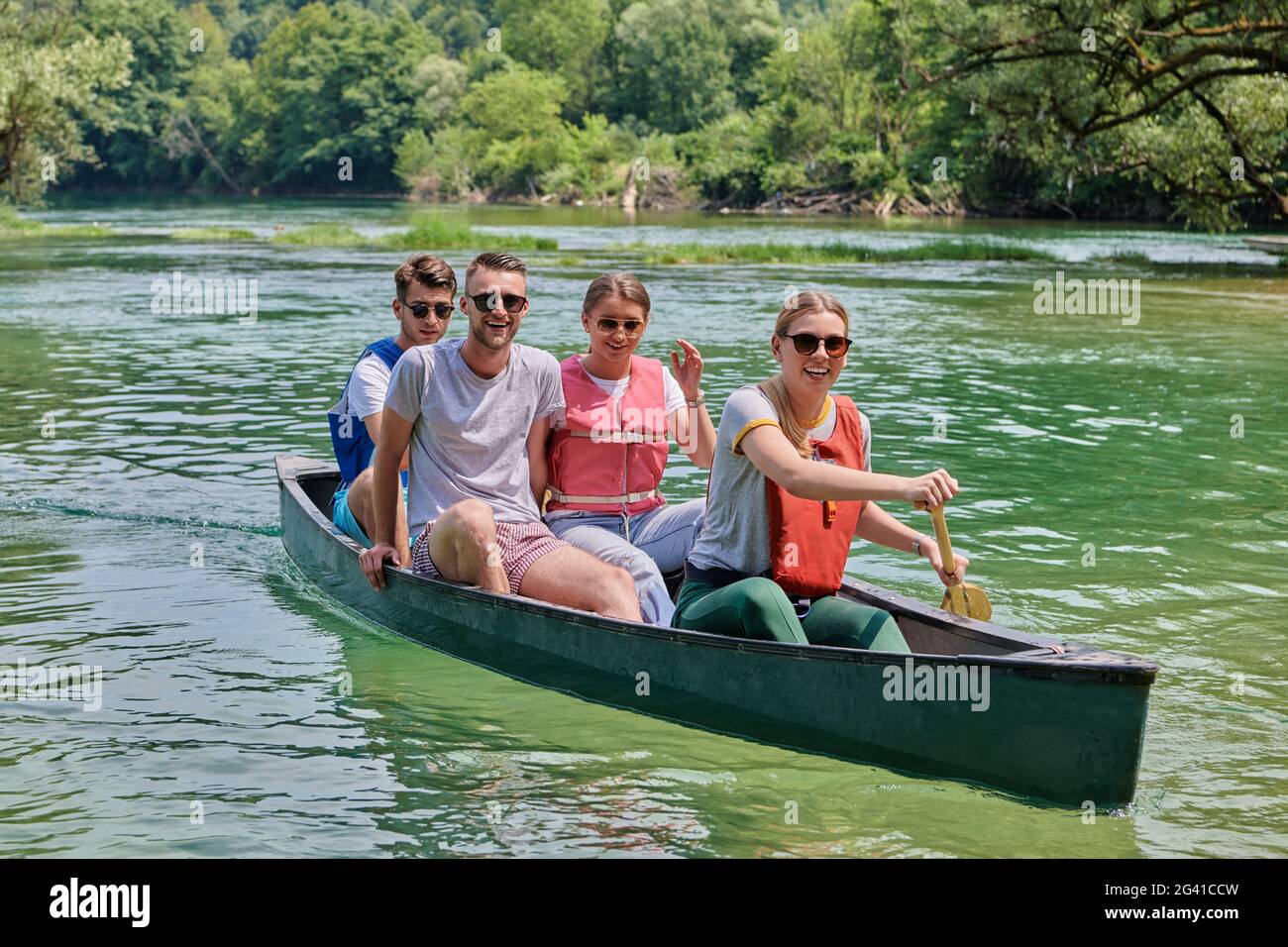Group adventurous explorer friends are canoeing in a wild river Stock ...
