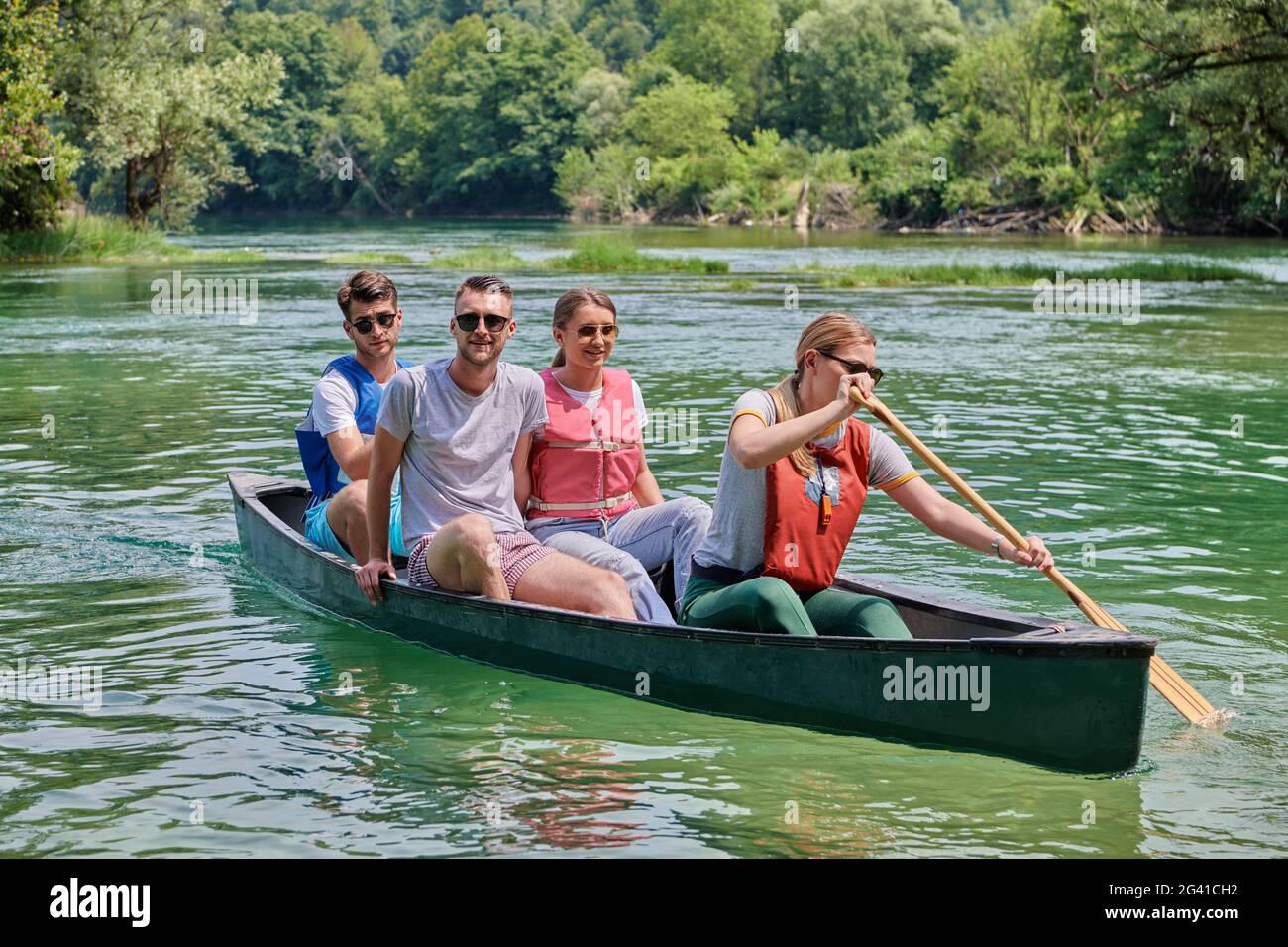 Group adventurous explorer friends are canoeing in a wild river Stock ...