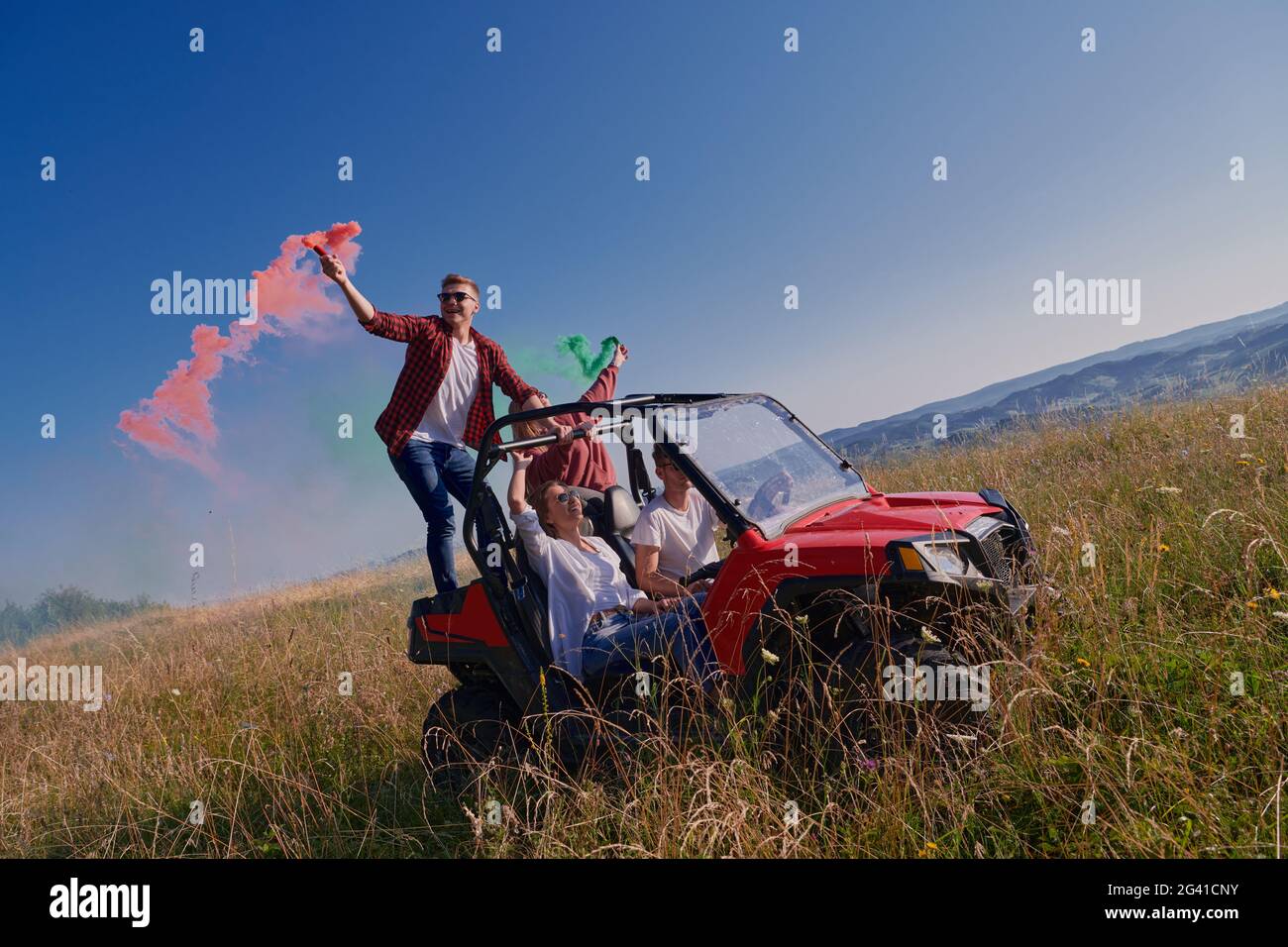 Colorful torches while driving a off road buggy car Stock Photo - Alamy