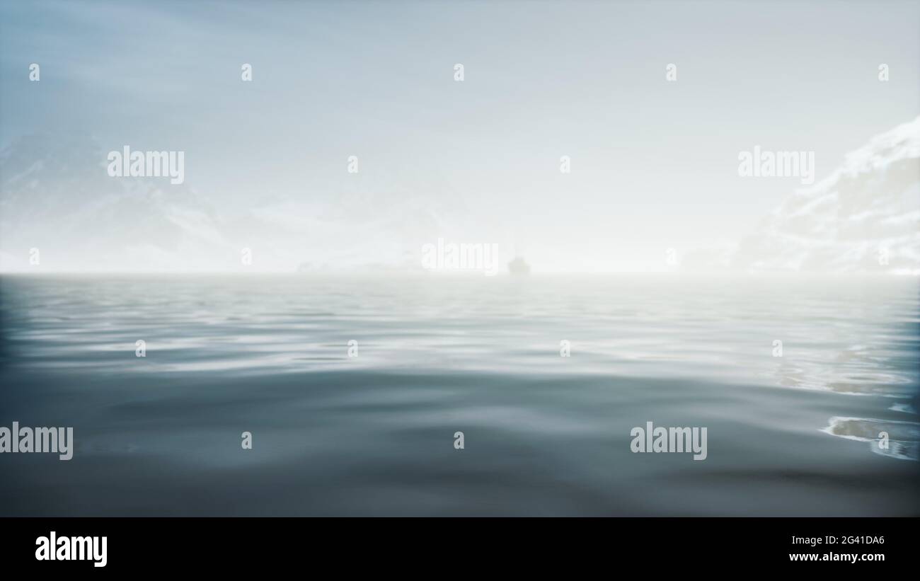 Snow covered mountains in northern ocean Stock Photo - Alamy