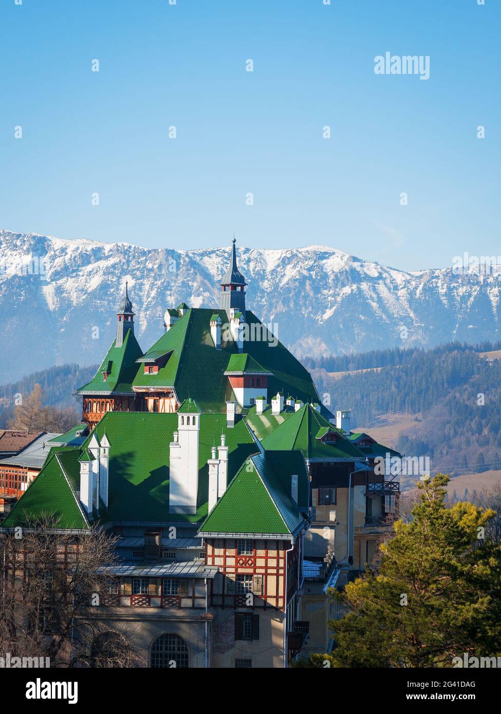 Green coloured roof of a vast building in the mountains Stock Photo - Alamy