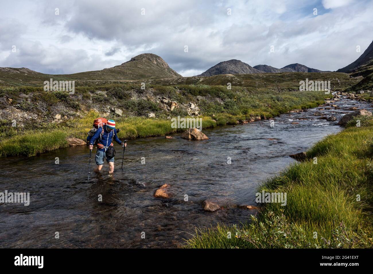 Hikers ford a river, Sisimiut, Greenland Stock Photo - Alamy