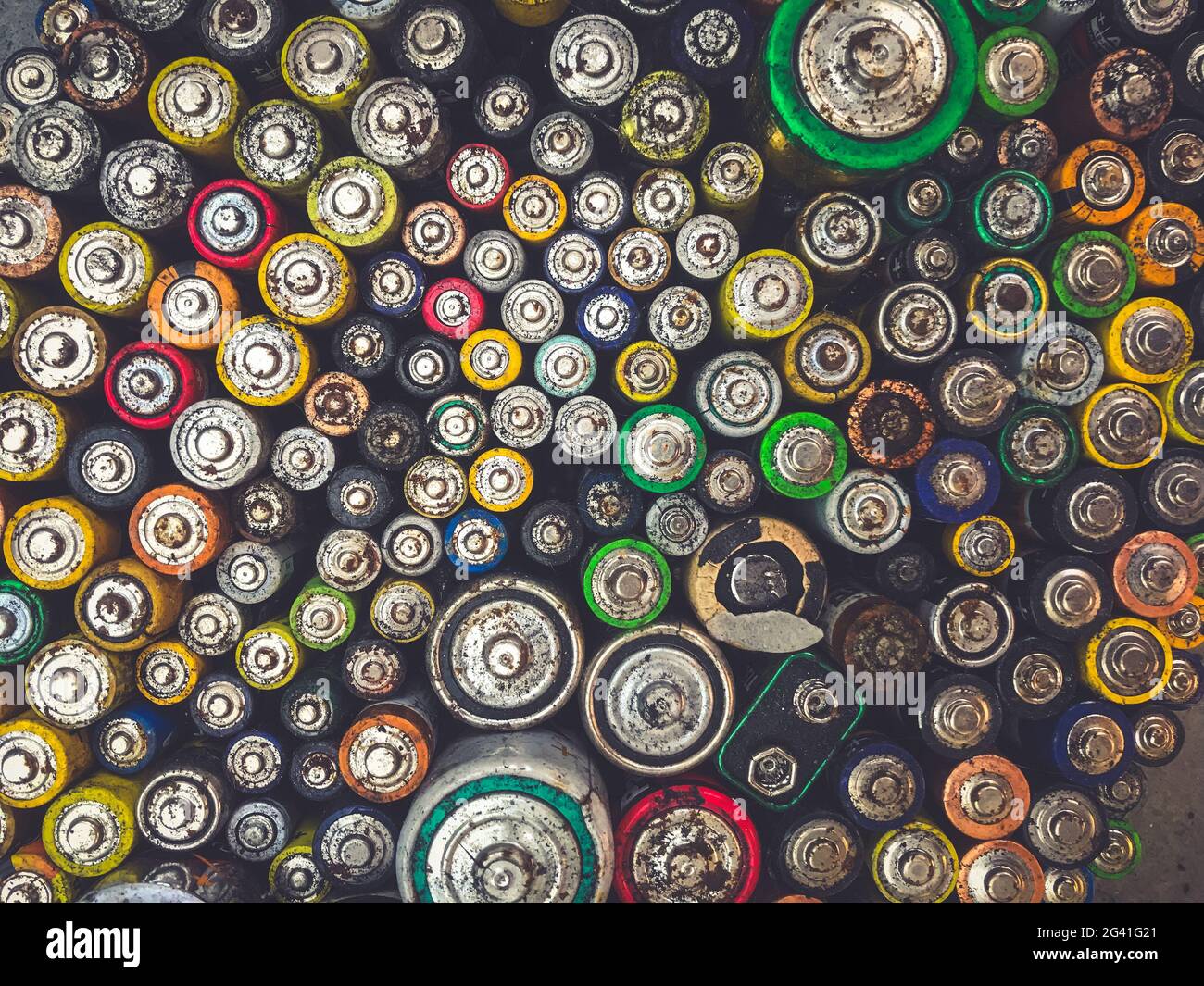 Old used batteries group. Top view background texture Stock Photo - Alamy