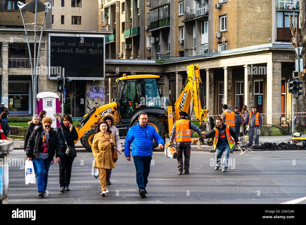 People moving, pedestrians walking in downtown district of Bucharest ...
