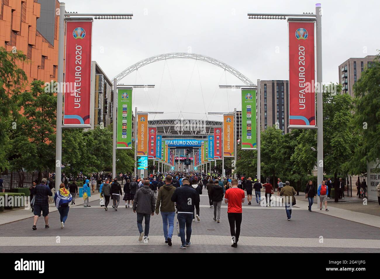 London, UK. 18th June, 2021. Fans make their way down Wembley way prior ...