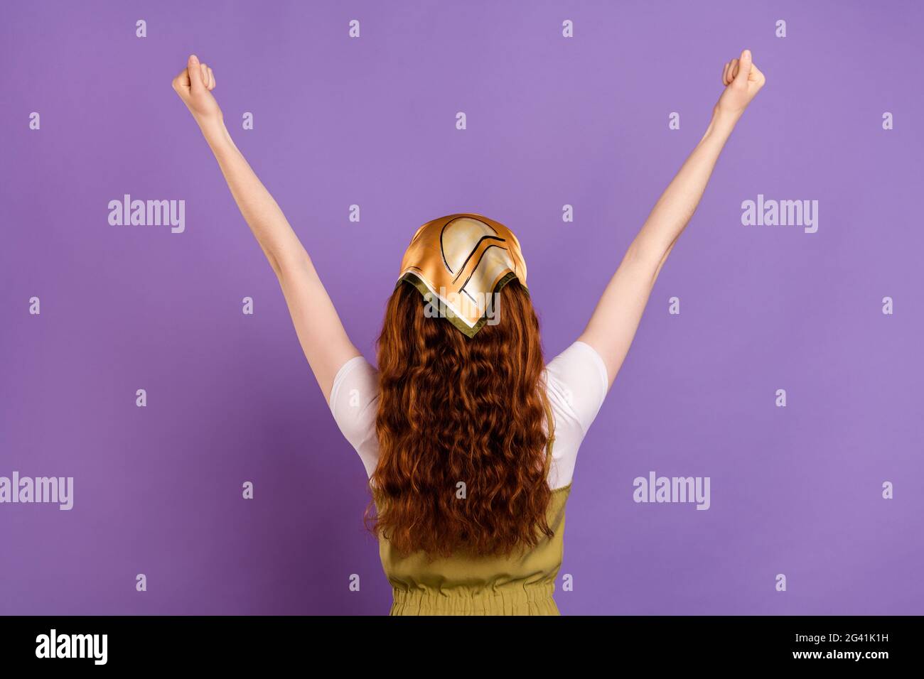 Back rear spine view photo of red haired woman raise hands winner ...