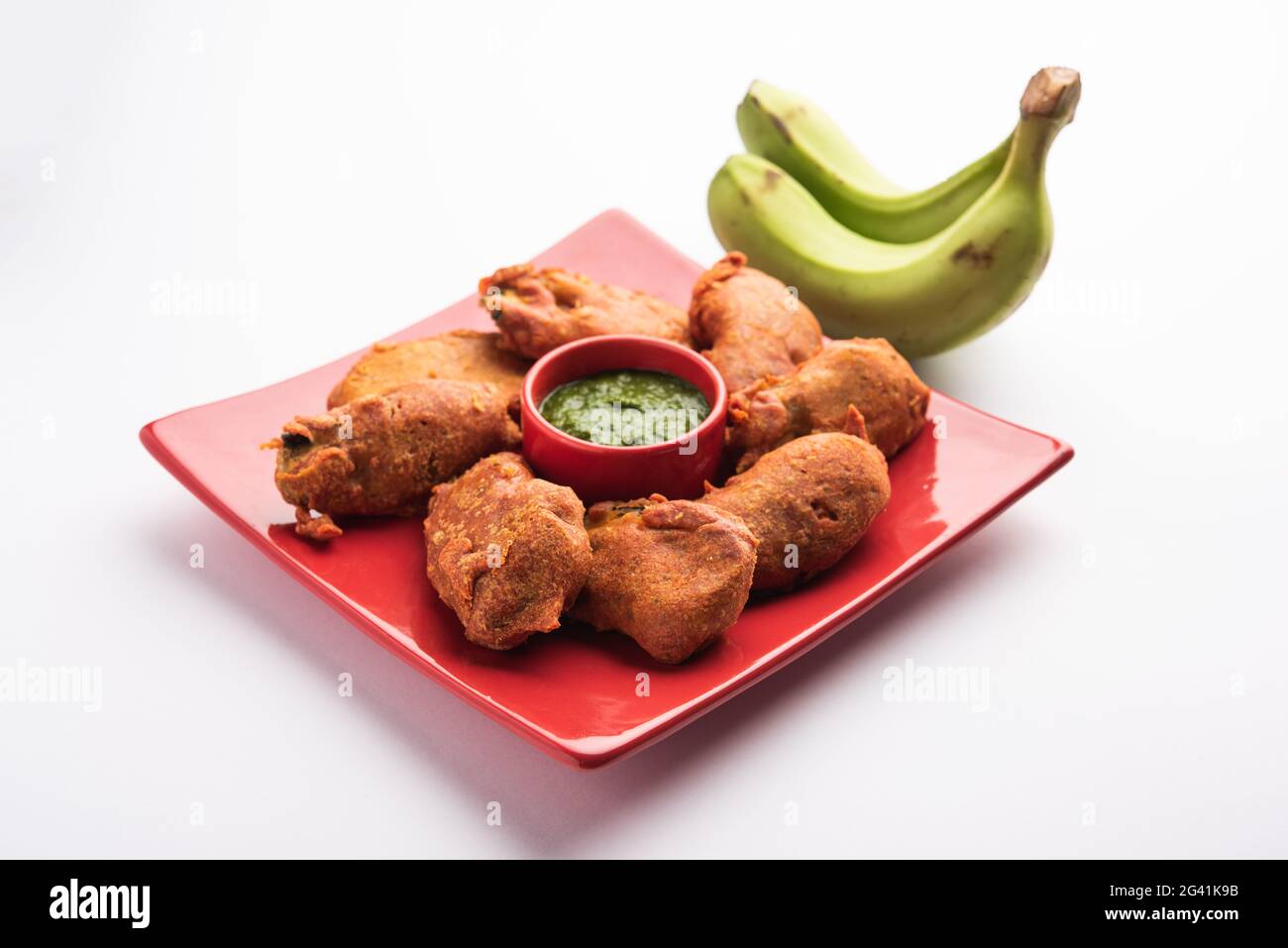 Banana Fritter or pakora or raw kela pakoda or bajji served with ...