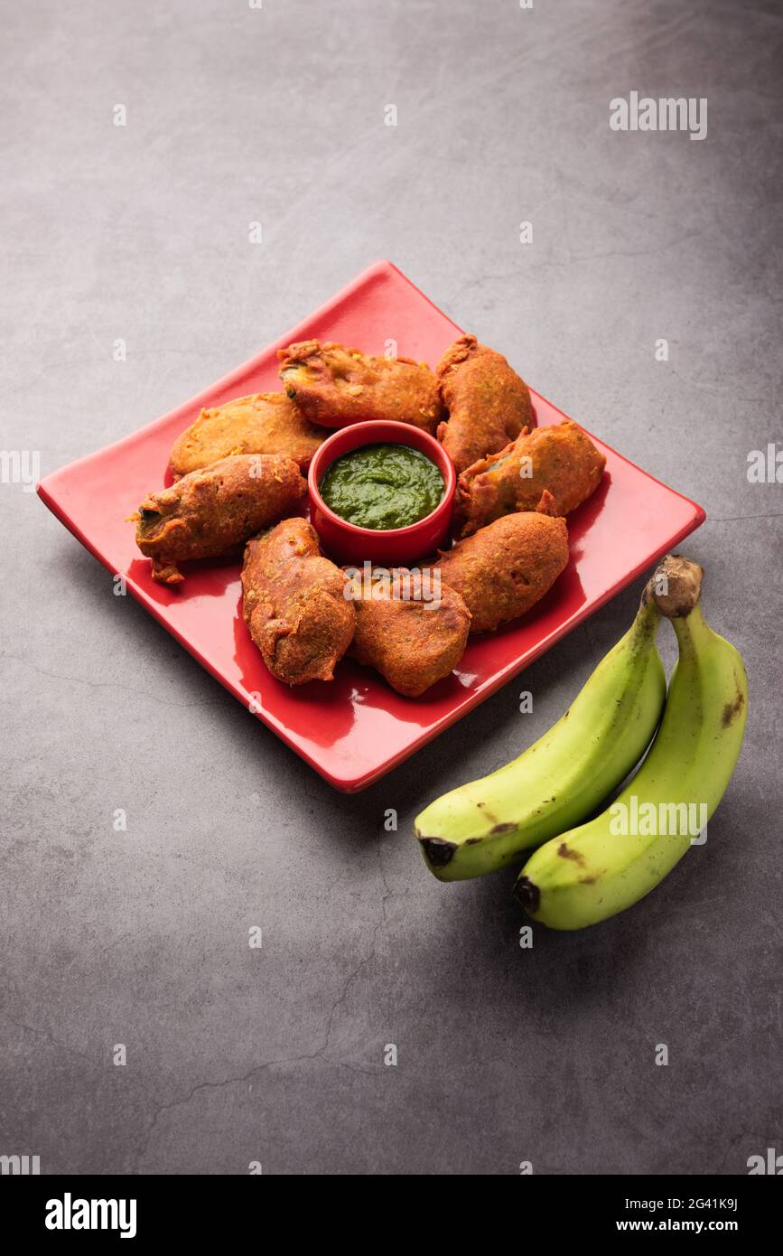 Banana Fritter or pakora or raw kela pakoda or bajji served with ...