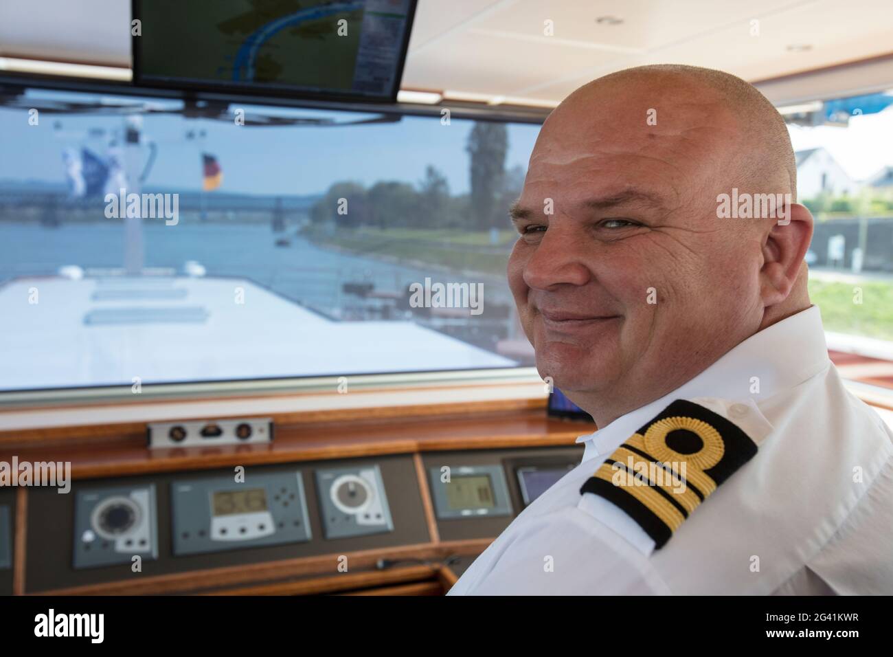 Cruise ship captain on bridge hi-res stock photography and images - Alamy