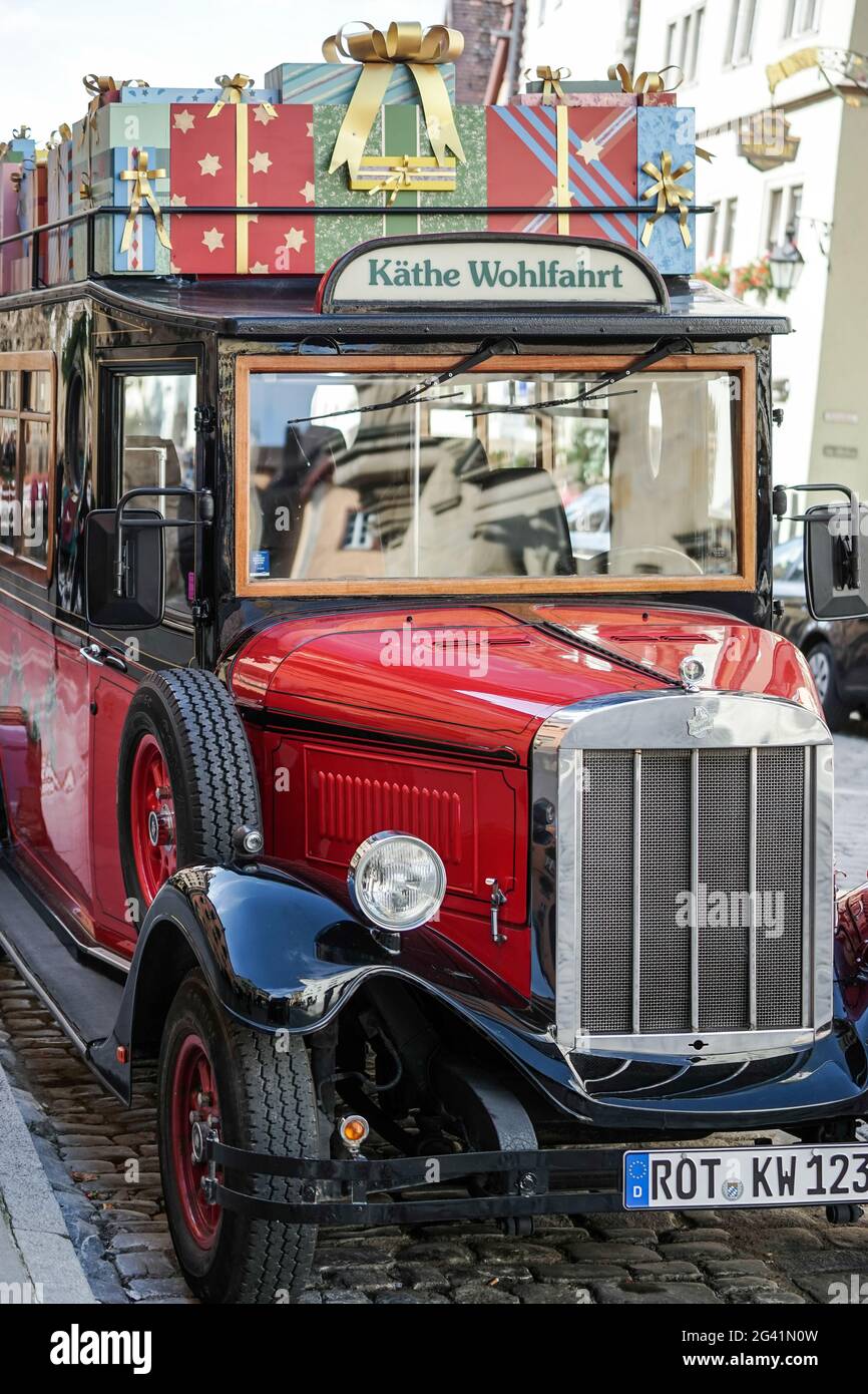 Old fashioned red bus in Rothenburg Stock Photo - Alamy