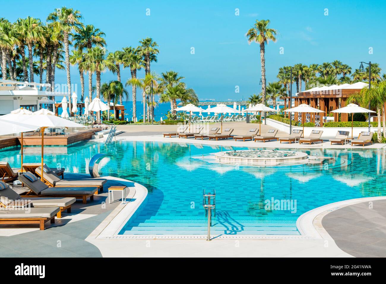 Limassol, Cyprus - May 19, 2021: Pool area in luxury modern hotel with ...