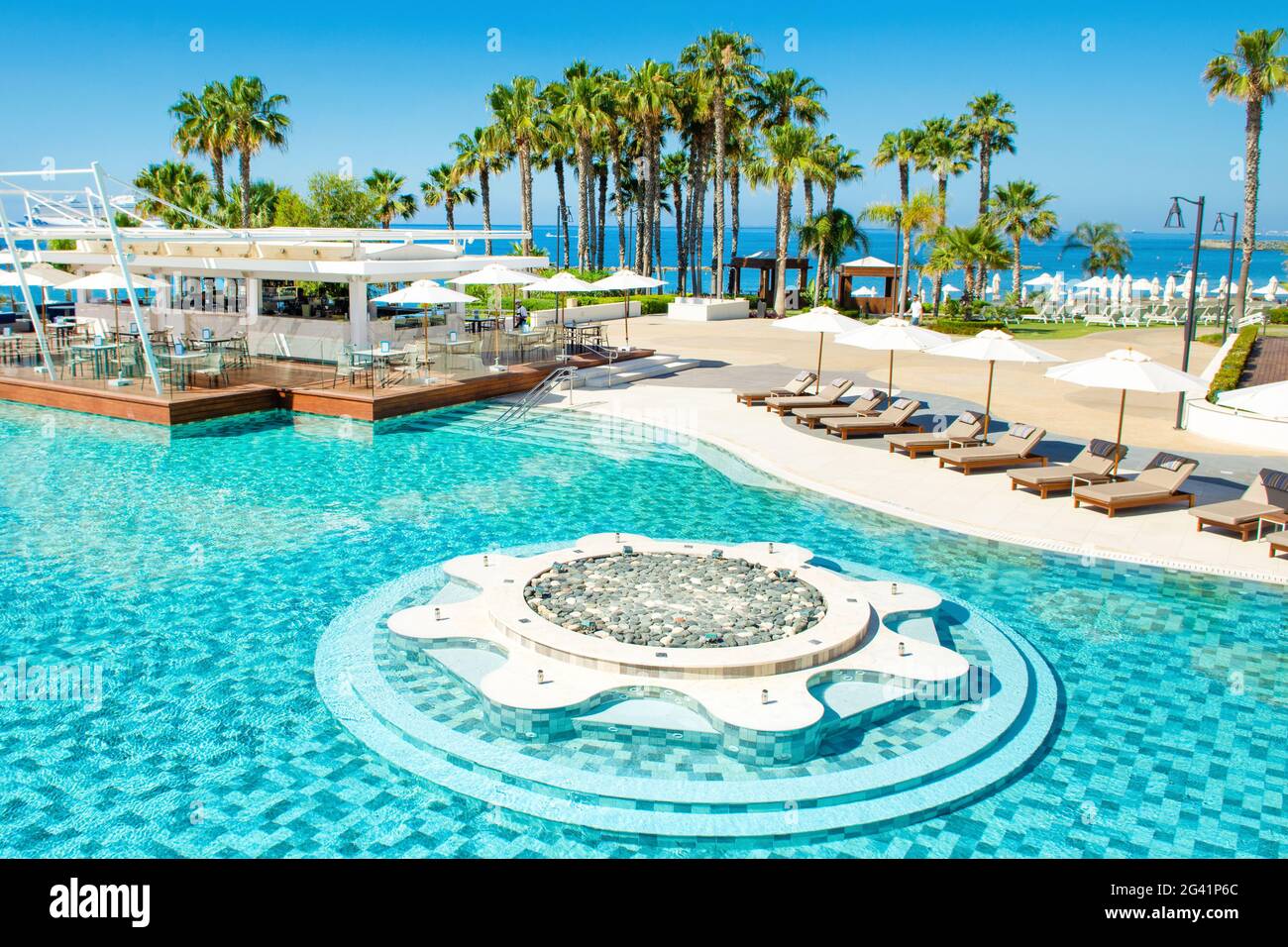 Limassol, Cyprus - May 19, 2021: Pool area in luxury modern hotel with ...