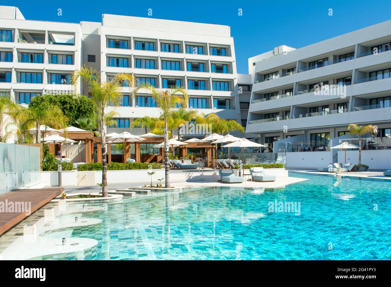 Limassol, Cyprus - May 19, 2021: Pool area in luxury modern hotel with ...